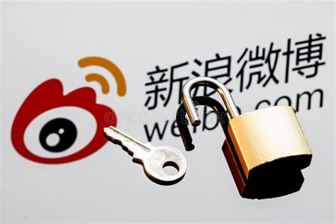 An Open Security Lock And Key On Background Of Weibo Chinese Microblogging Service Logo In