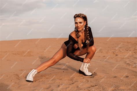 Premium Photo Young Beautiful Sexy Woman In A Sexy Position In The Desert