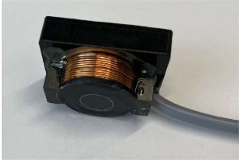 Nanoparticle Cell Interface Enables Electromagnetic Wireless Programming Of Mammalian Transgene