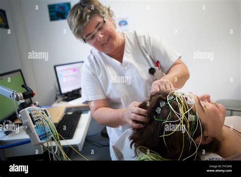 Woman Undergoing Electroencephalogram Eeg Hi Res Stock Photography And Images Alamy