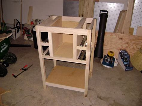 Using A Pocket Hole Jig To Attach The Lower Rails Of The Cabinet Router Table Diy Router