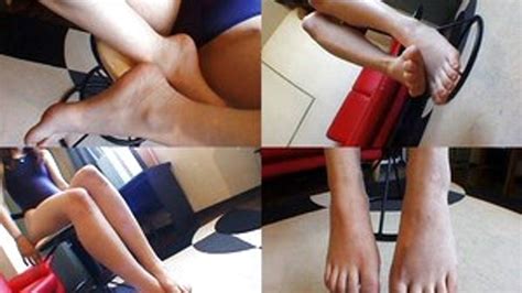 Domina Gives Her Long Toed Feet A Rub While On Her Swimsuit Full