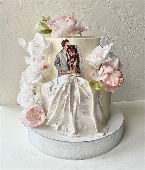 Свадебный торт с молодожёнами Розовый свадебный торт Свадебный торт Свадебные торты