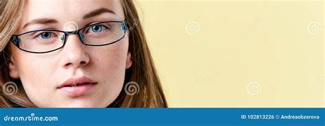 Beautiful Redhead Teenager Girl With Freckles Wearing Reading Glasses Smiling Teen Portrait