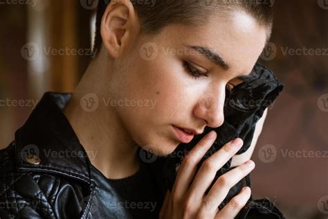 Face An Unhappy Young Woman With Short Haircut Is Crying Close Up Eyes