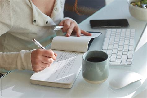 Female Handwriting On A Notebook By Stocksy Contributor Miquel Llonch Stocksy