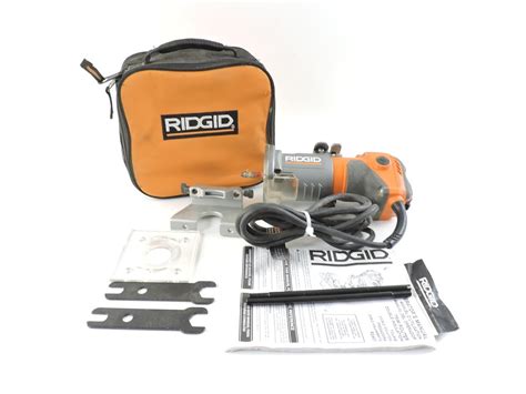 Police Auctions Canada Ridgid R2401 5 5a Corded Compact Router With Zip Case And Accessories