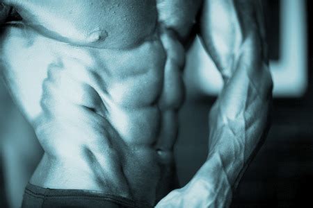Professional Champion Male Bodybuilder Muscular Man Semi Nude Posing In