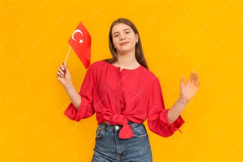 Premium Photo Cheerful Cute Girl With Turkish Flag In An Orange Photo
