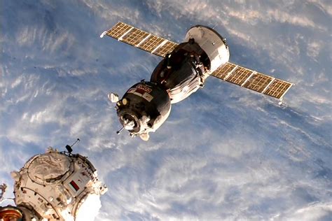 Photos Soyuz Rocket Thunders Off With Next Iss Crew