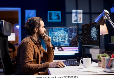 Teleworking Programmer Using Computer Artificial Intelligence Stock