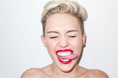 Miley Cyrus Tattoos Tongue And Teeth