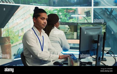 Indian Worker Operating On License Plate Registration Via Cctv Radar Footage Working With Video