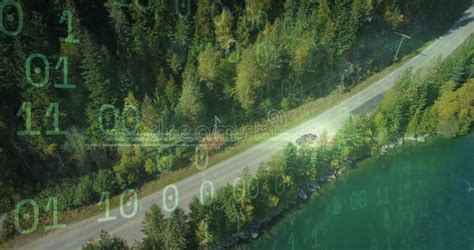 car driving on forest road with digital binary code overlay animation stock video video of