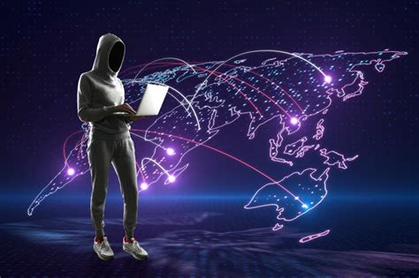 Premium Photo Hacker In Hoodie Using Laptop With Glowing Map And