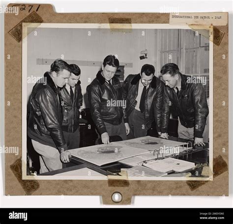 A Senior Coast Guard Ice Patrol Pilot Briefs His Team Before An Ice Patrol Survey Flight Using