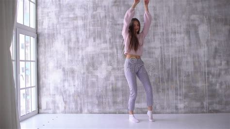 Awesome Caucasian Attractive Joyful Happy Dance Girl Dancing On Grey