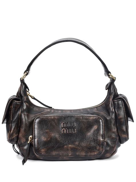 Сумка кожаная от Miu Miu за 383 000 рублей цвет коричневый артикул 5bc1462f8n F0002