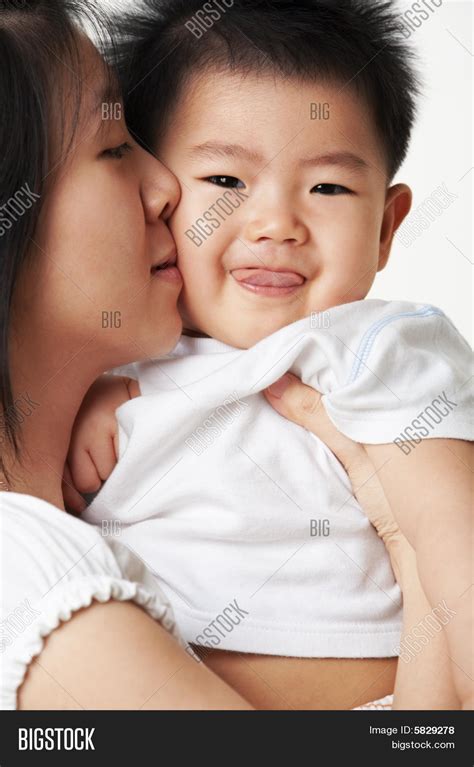 Mother Kiss Her Son Image And Photo Free Trial Bigstock