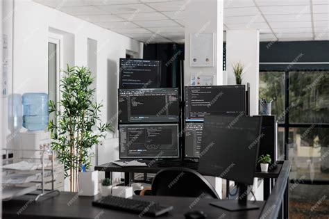 Premium Photo Pc Desk With Multiple Monitors Running Terminal Window