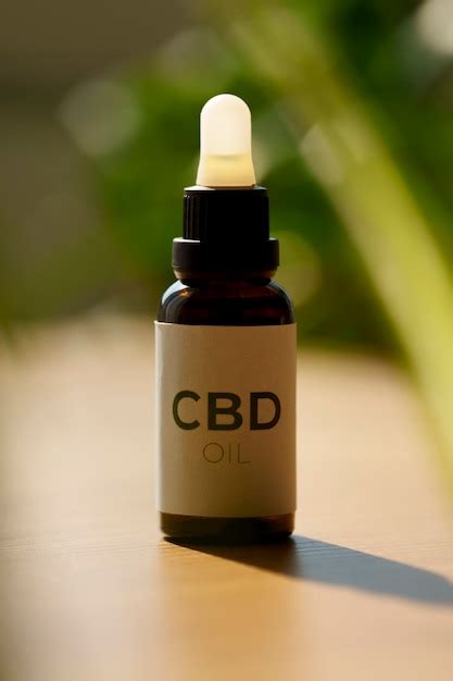 Free Photo Close Up On Cbd Oil Bottle