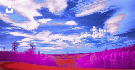 Vibrant Inverted Colors Illuminate The Landscape And Sky Photo Free Land Image On Unsplash