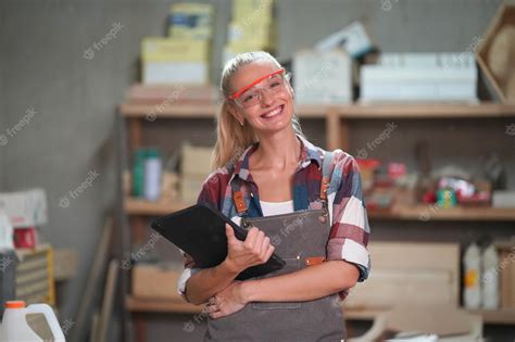 Premium Photo Carpenters Assembling Furniture Small Business In Wood