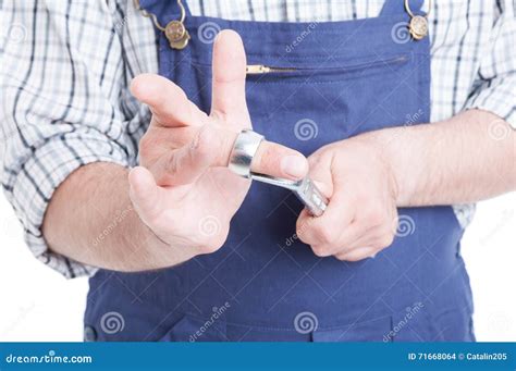 Mechanic Hands In Close Up Simulating Penetration With A Spanner Stock Photo Image Of Closeup