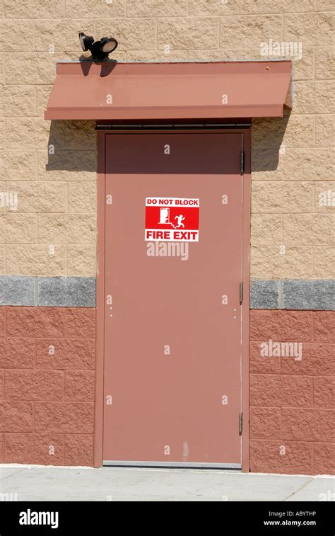 Do Not Block Fire Exit Sign On Door To Prevent Automobiles From Blocking Escape Routes From A