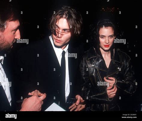 Johnny Depp And Winona Ryder Attend The 1990 Nato Showest Convention On