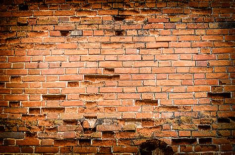 텍스처 배경 패턴입니다 빈티지 한 오래 된 시멘트 돌 담 금이 착용 하 고 창조적인 포스터 디자인을 착용 균열 긁힌 자국 오래 된 페인트 박 리 및 배경에서 석고의 시멘트