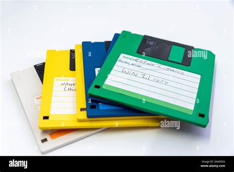 Floppy Disk Stack One With A Copy Of Microsoft Windows 31 Hand