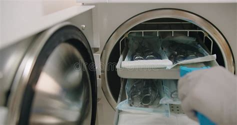 Woman Taking Out Manicure Tools From Autoclave After Sterilization Stock Video Video Of Glove