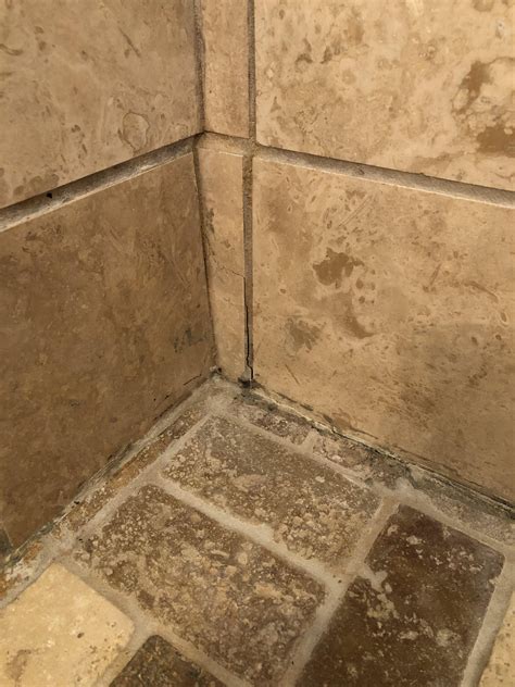 Grout Cracking In Stone Shower Should I Re Grout Or Caulk To Seal R