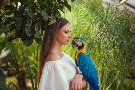 Premium Photo Close Up Of Woman With Parrot