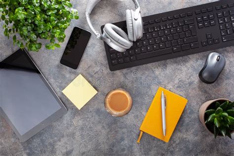 Home Office Desk With Keyboard Computer Smartphone Notebook Houseplants