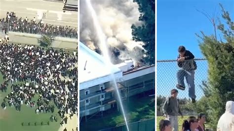 Students Evacuated As Firefighters Battle Rooftop Fire On John F