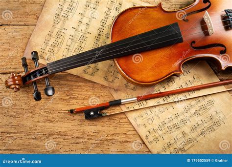 Classic Retro Violin Music String Instrumt With Old Music Note Sheet