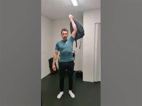 Unilateral Backpack Overhead Press Uitleg Youtube