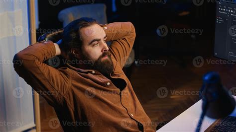 Annoyed Software Developer Exasperated After Failing To Remove All Bugs While Coding On Computer