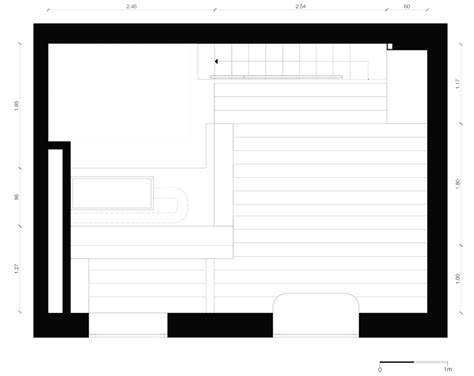 Pale Utility Unit Supports Mezzanine In A Berlin Micro Apartment