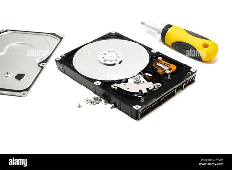 Open Hard Drive And Screwdriver Isolated On White Background Closeup Computer Hard Drive HDD