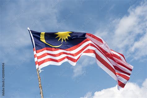 Malaysia Flag Also Known As Jalur Gemilang Wave With The Blue Sky People Fly The Flag In