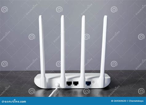 Wi Fi Router On Grey Textured Table Back View Stock Photo Image Of Point Adsl 269369620