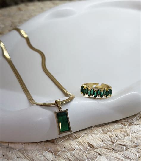 Trendella 18k მოოქროვილი ყელსაბამი და ბეჭედი ცირკონის თვლებით 44 ლარი Facebook