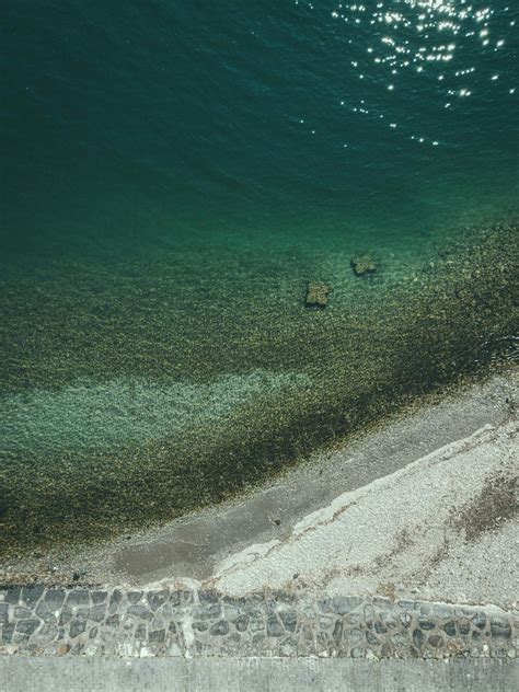 집 밖의 경치가 좋은 고요한 공중 라이프스타일 맑은 물 모래 모래사장 물이 있는 경치 밀물과 썰물 바다 바다 경치 바다의 뷰포인트 상쾌한 손을