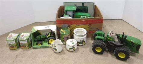 John Deere Items Include Toy Tractors Cookie Jar Tractors Various Pots And Containers John