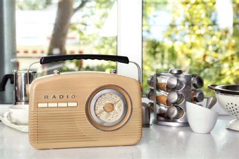 Premium Photo | Stylish radio receiver on kitchen table