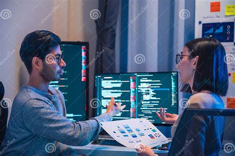 Asian And Indian Developer Devops Team Discussion About Coding Promgram