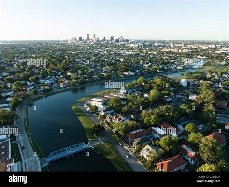 Aerial View Of The Historic Bayou St John Winding Through A Lush New Orleans Neighborhood With